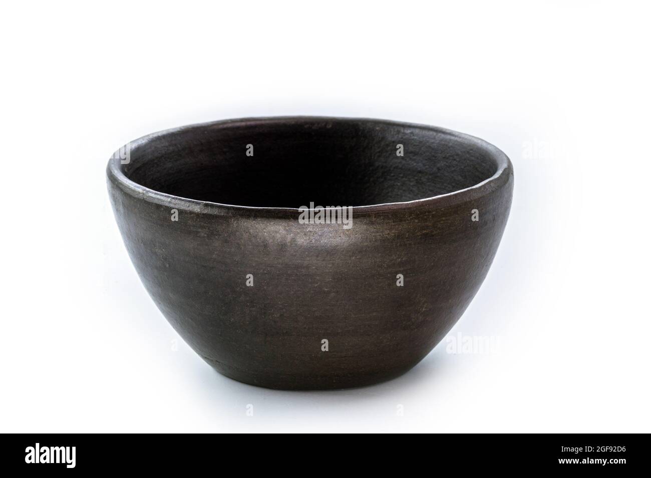 handmade clay container bowl, made in brazil, with isolated white ...