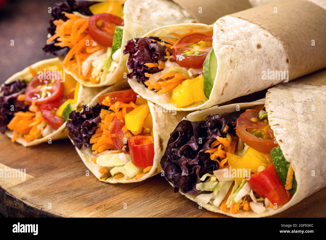 vegan wrap, made with flat bread and various vegetables, healthy fast ...