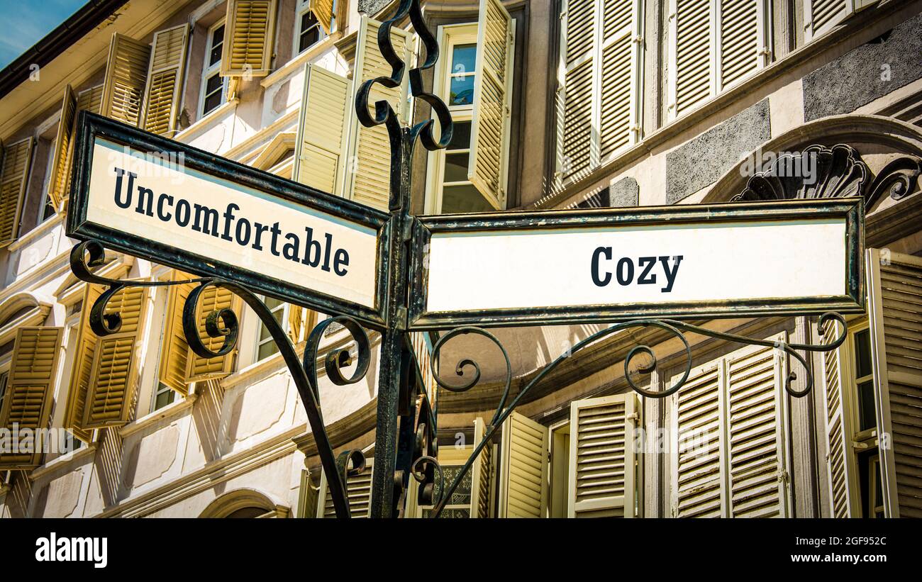 Street Sign the Direction Way to Cozy versus Uncomfortable Stock Photo ...
