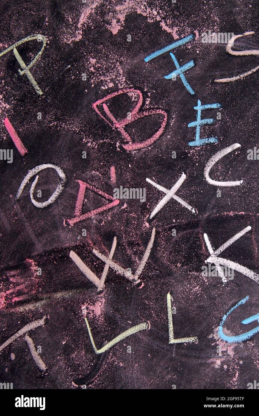 The colors of the letters, written with chalk on blackboard Stock Photo ...