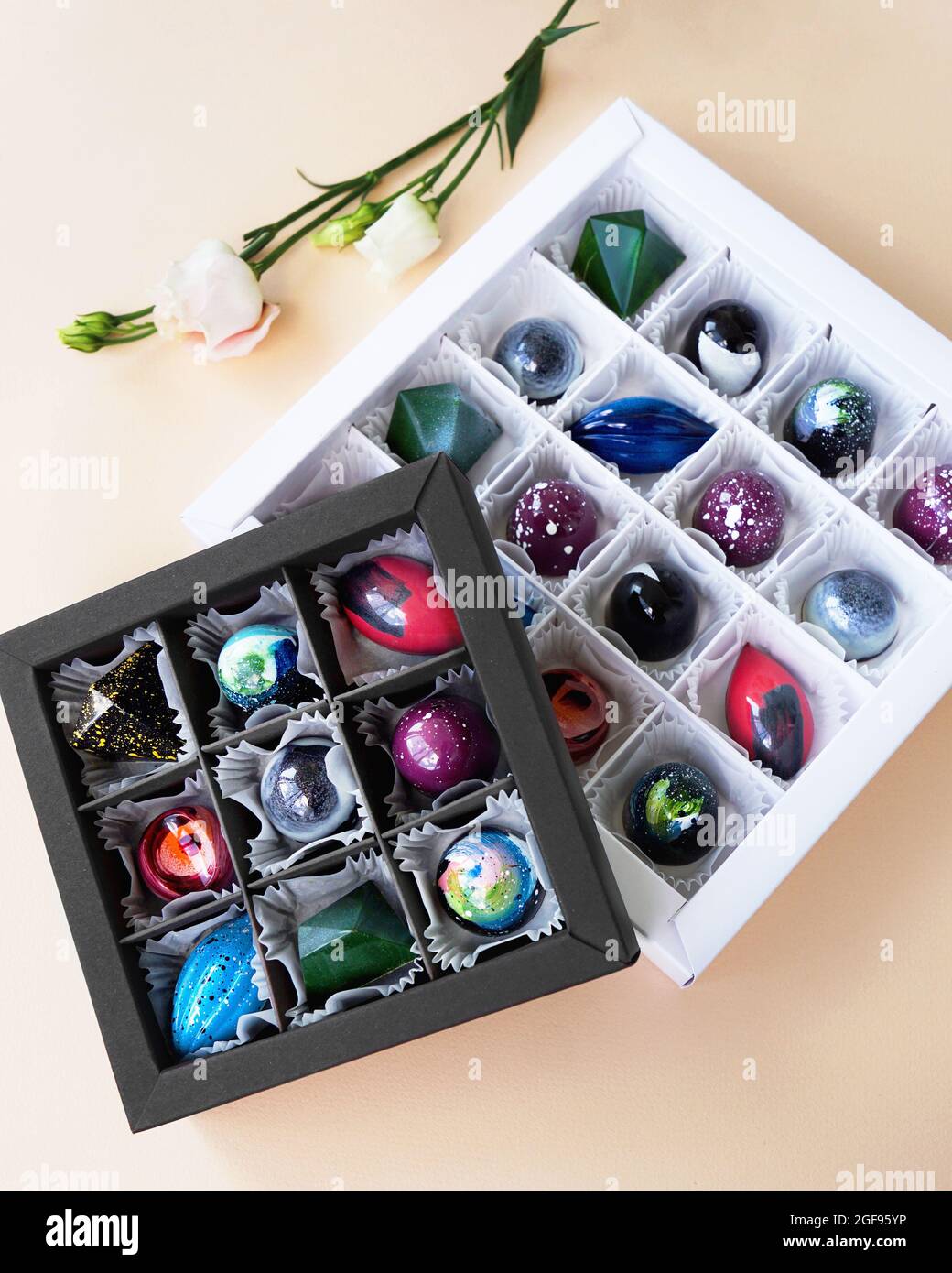 Gift box of handmade chocolates. Geometric and space design. Box on a ...