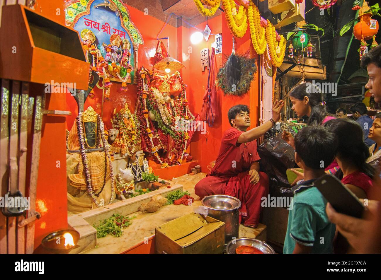 KOLKATA, WEST BENGAL, INDIA - 13 MAY 2017: Hindu priest worshipping ...