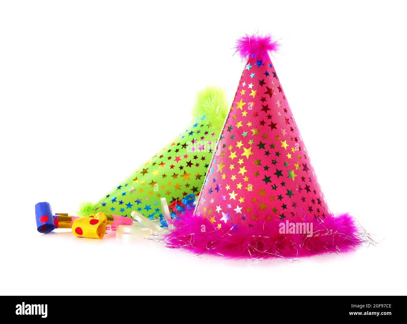 Two party hats on white background Stock Photo - Alamy