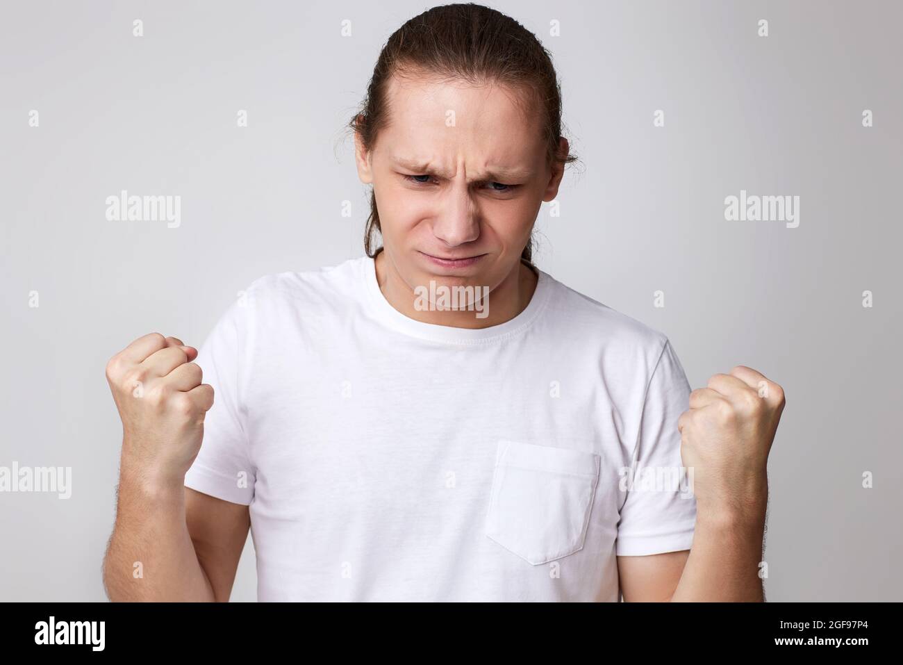 Emotions of a television fan. Screams, hatred, rage Stock Photo - Alamy