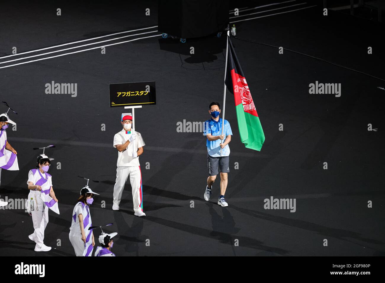 Tokyo olympics flag bearers hi-res stock photography and images - Alamy