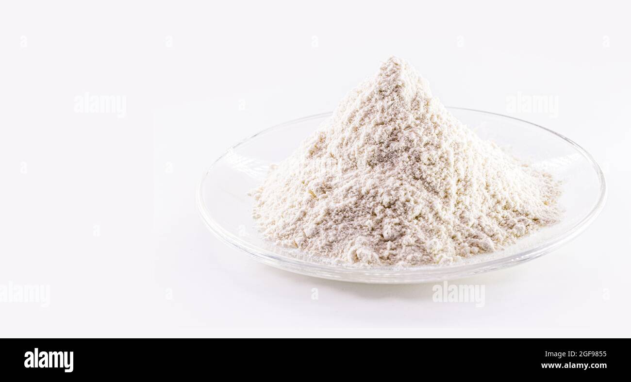 Pile of calcium sulfate on white background, known as micronized ...