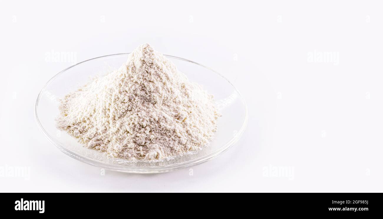 Stack of baking soda on white background Stock Photo - Alamy