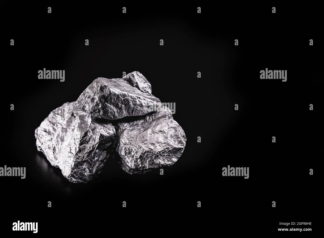 silver nugget native to Liberia isolated on black background Stock ...