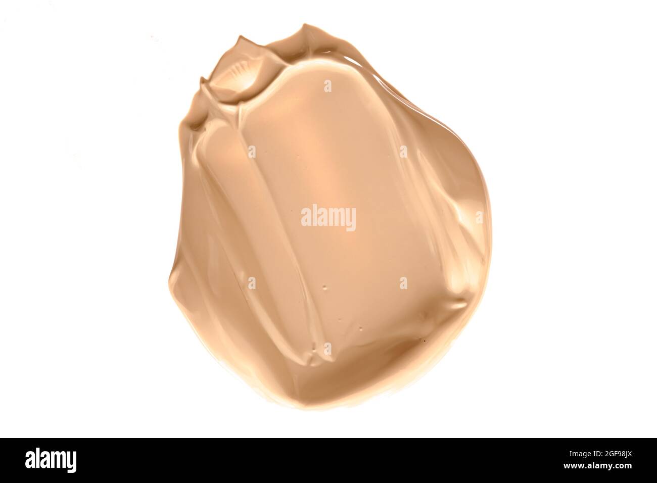 Beige beauty cosmetic texture isolated on white background, smudged ...