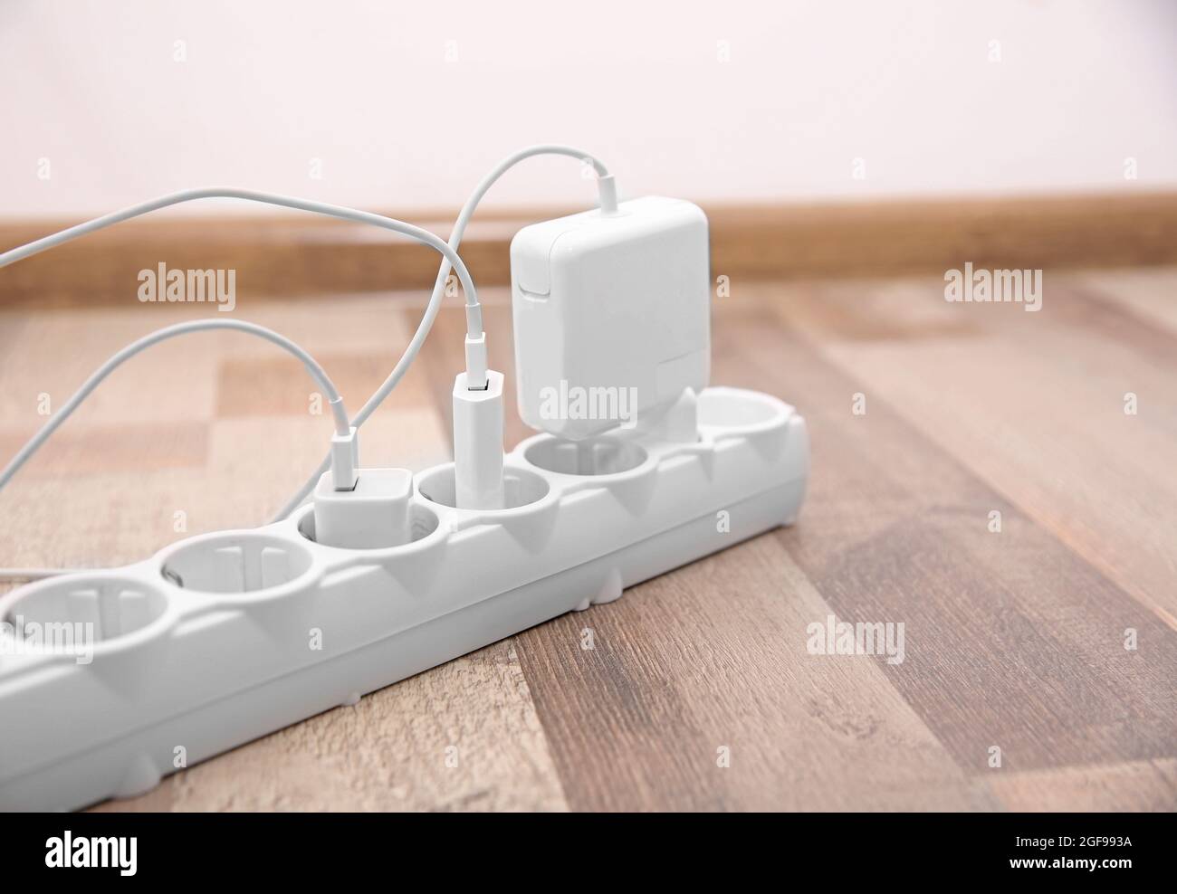 Power strip on floor Stock Photo - Alamy