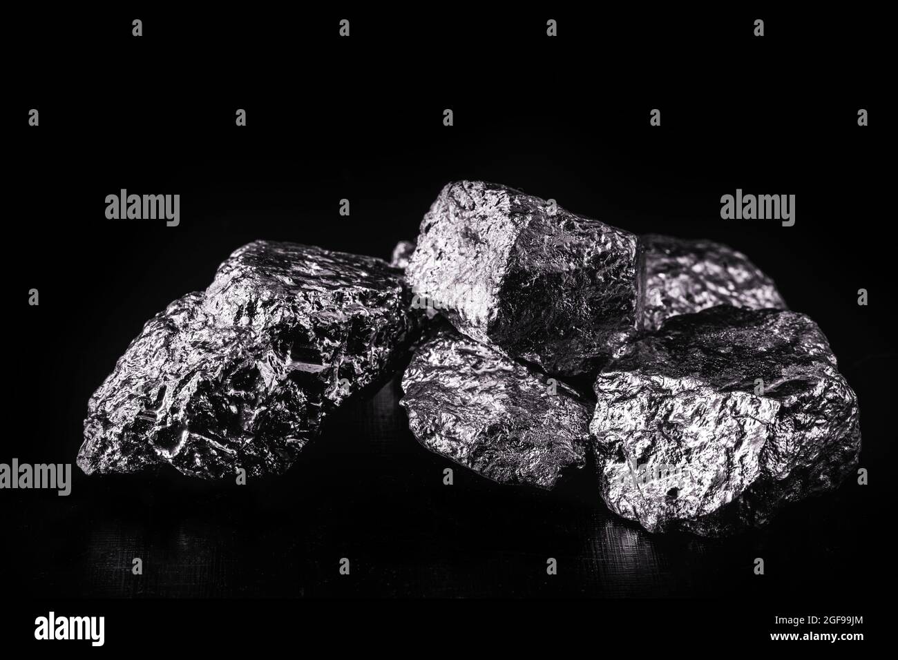 silver ore, silver nuggets isolated on black background Stock Photo - Alamy