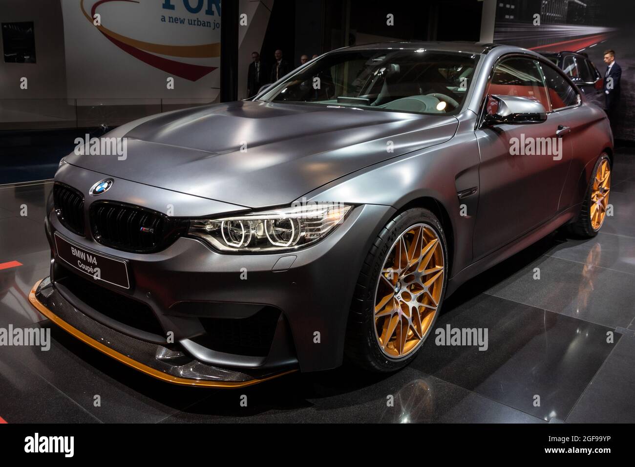 BMW M4 Coupe sports car showcased at the Brussels Expo Autosalon motor ...
