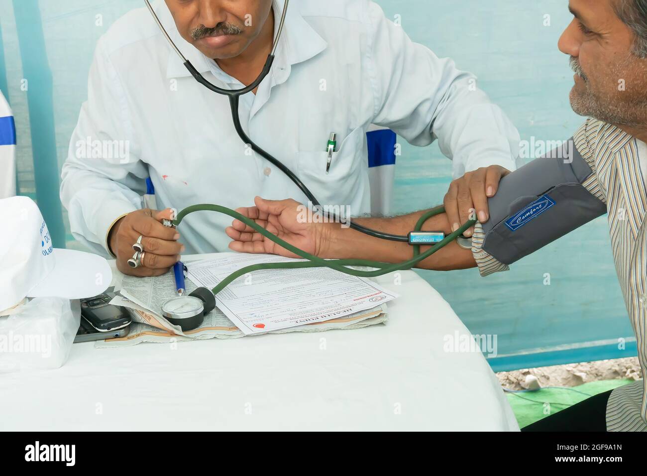Indian doctor hospital patient checking hi-res stock photography and ...