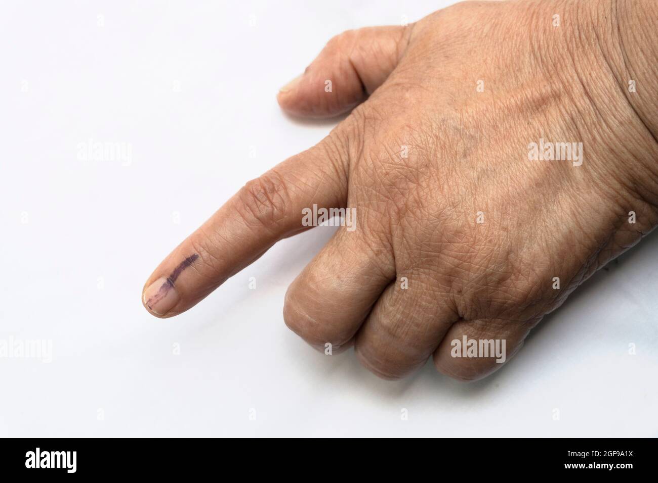 A senior citizen Indian woman voted , exercized her voting right and ...