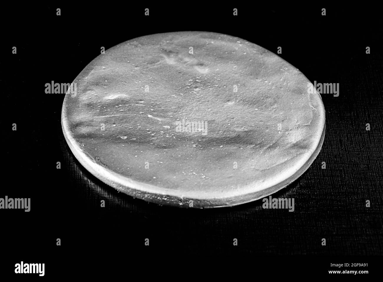 A highly enriched uranium billet. Original and without rotation. The ... A highly enriched uranium billet. Original and without rotation. The ...