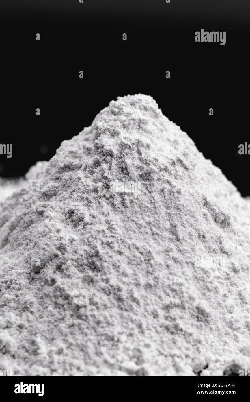 Small pile of flour, close-up. Starch-dehydrated powder, obtained from ...