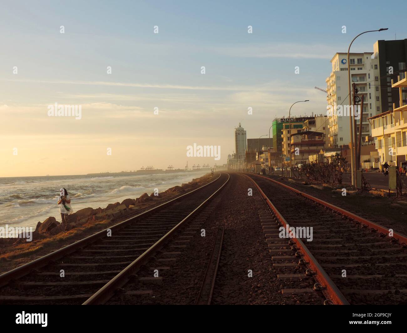 railroad in the city of colombo in the evening Stock Photo - Alamy