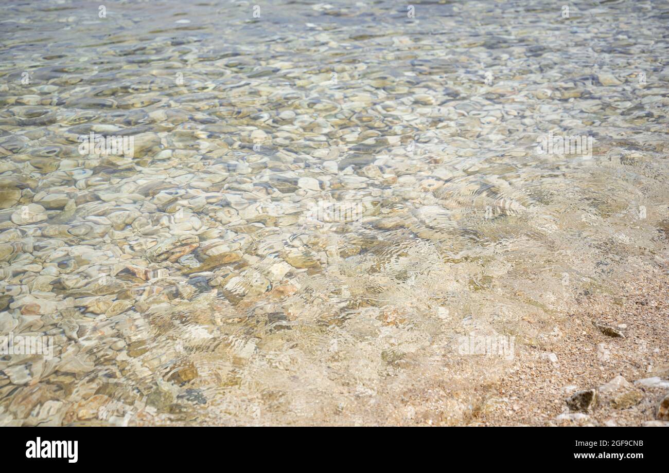 Natural seashore rocks clear water hi-res stock photography and images ...