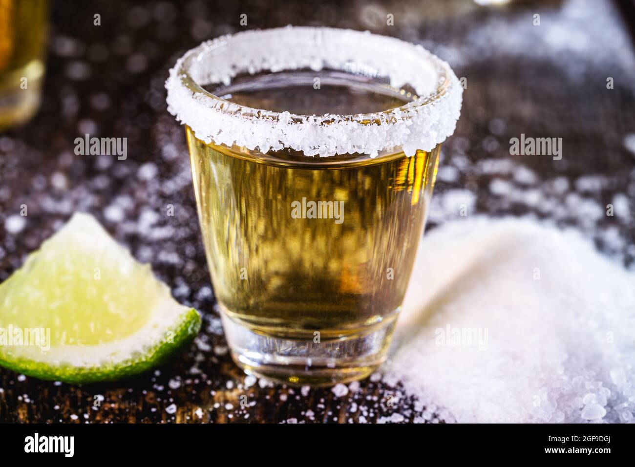 Tequila with lemon and salt on wood, typical mexican drink Stock Photo ...