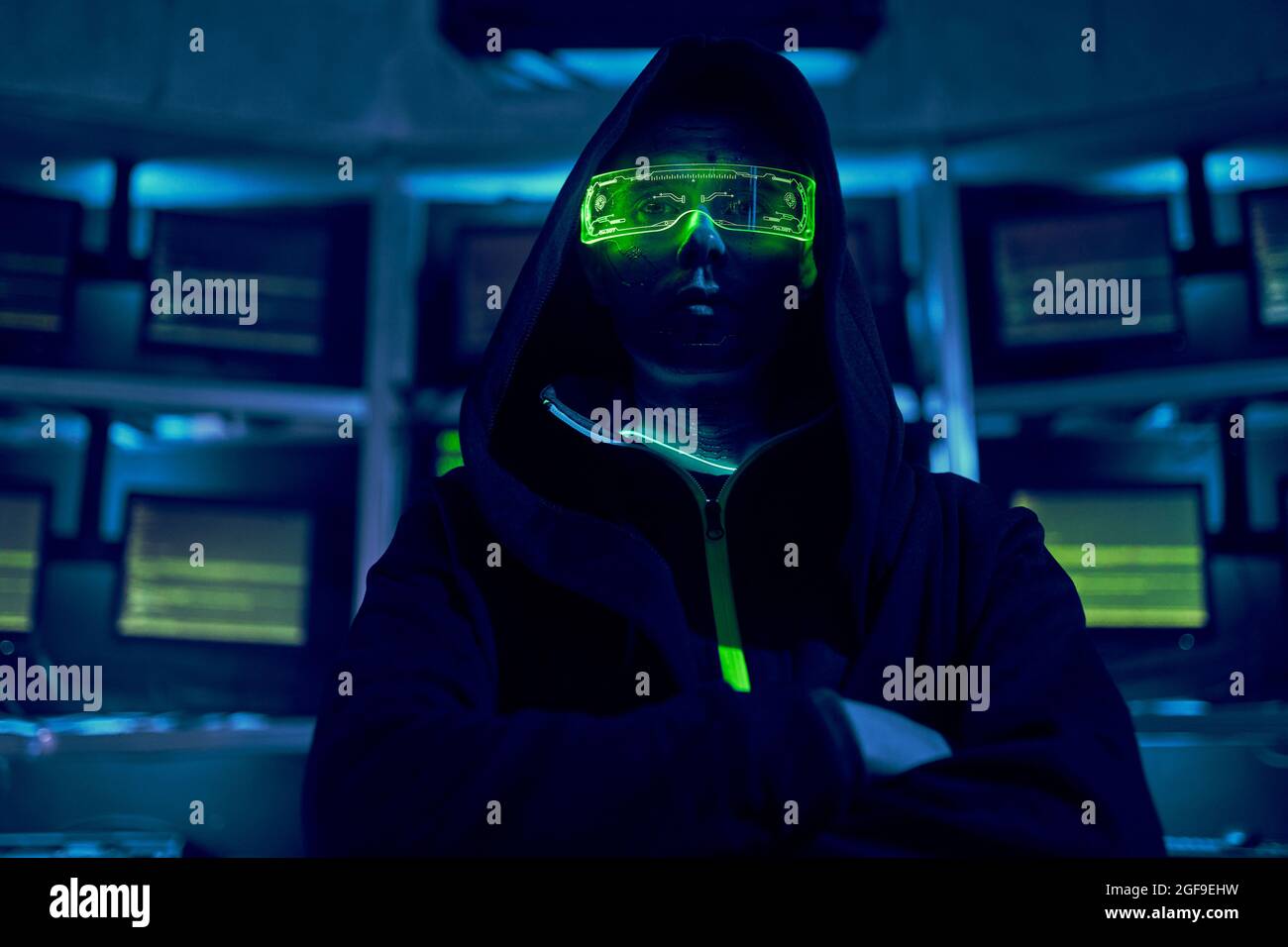 Portrait of a cyber hacker stealing information using a computer ...