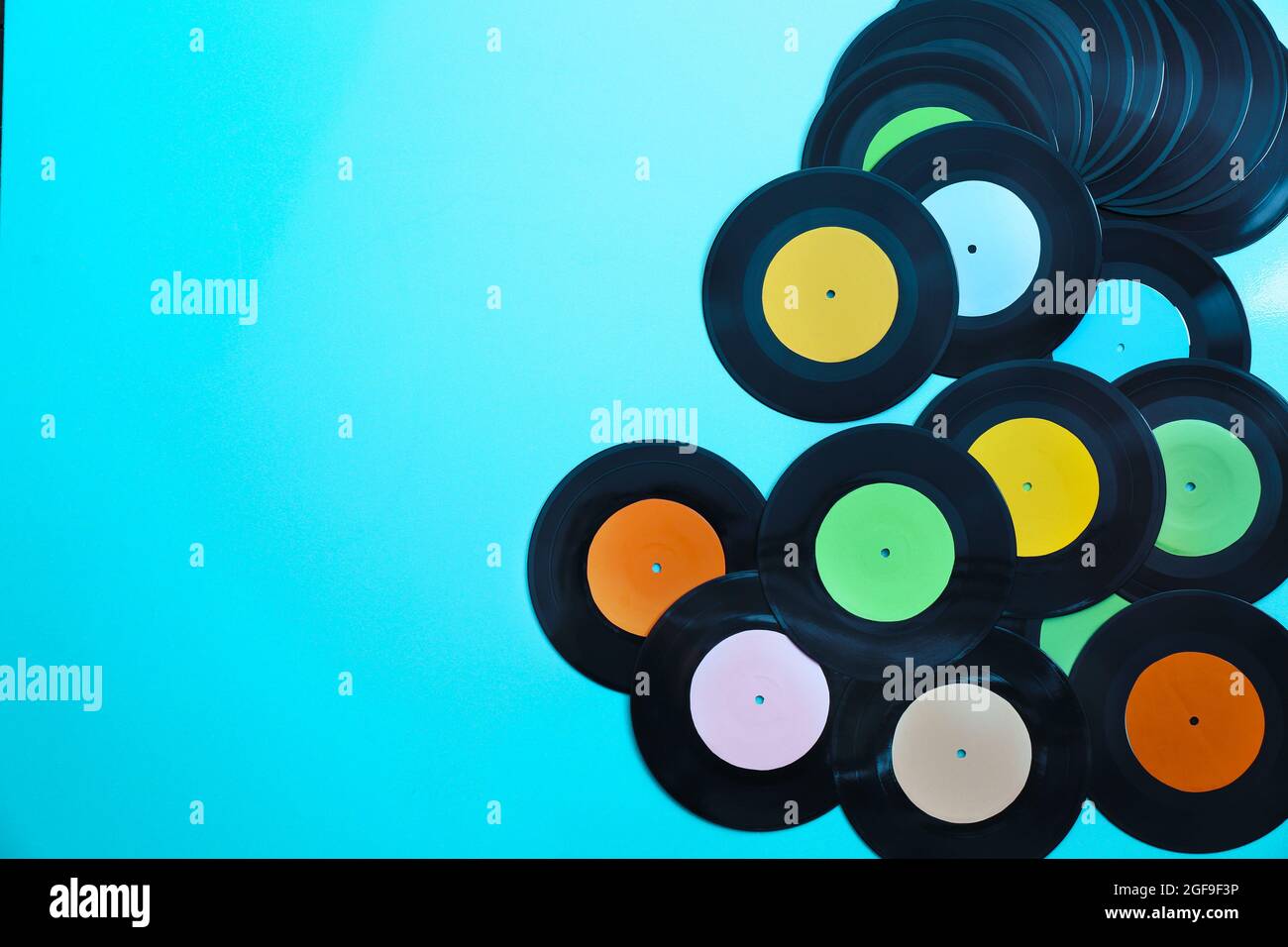 Vinyl records on blue background Stock Photo - Alamy
