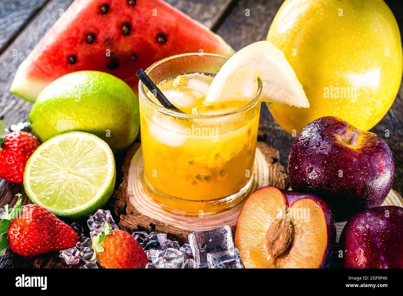 glass of typical Brazilian drink called caipirinha, passion fruit ...