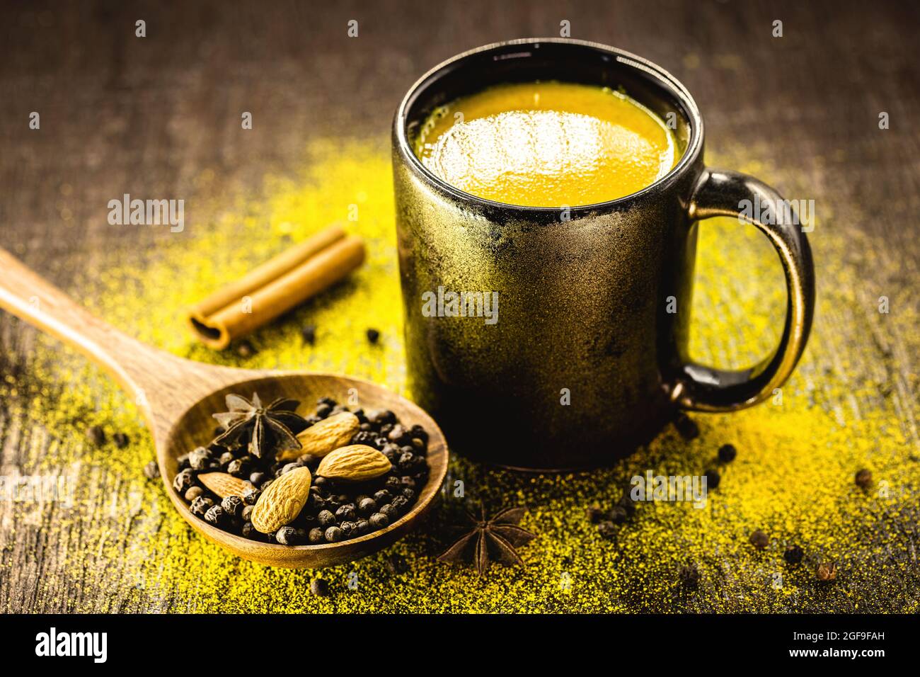 Turmeric and Cinnamon milk, golden milk, ancient Indian drink Stock ...