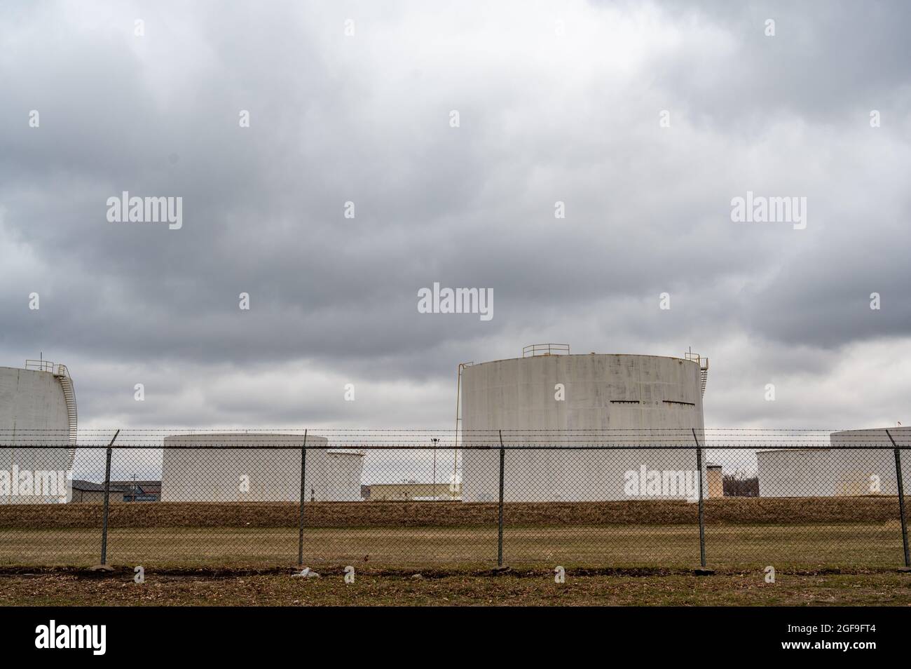 generic chemical tank farm with fencing for petrochemical production ...