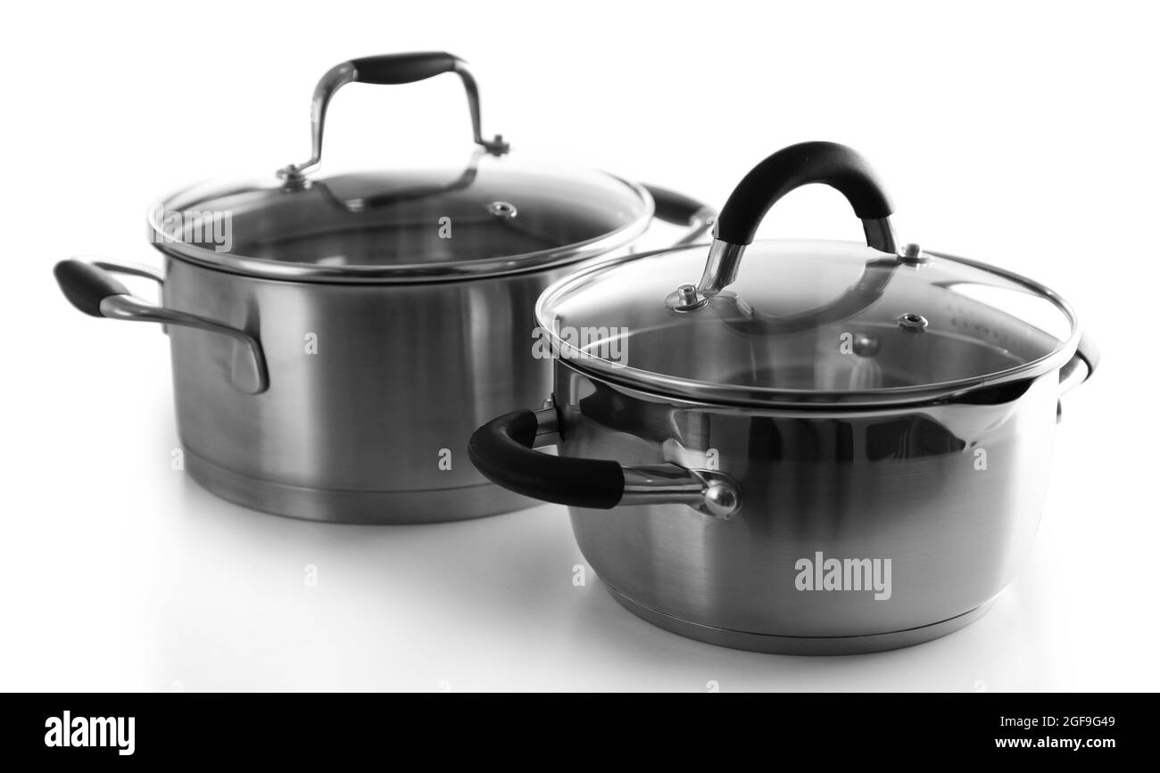 Metal pans isolated on white Stock Photo - Alamy
