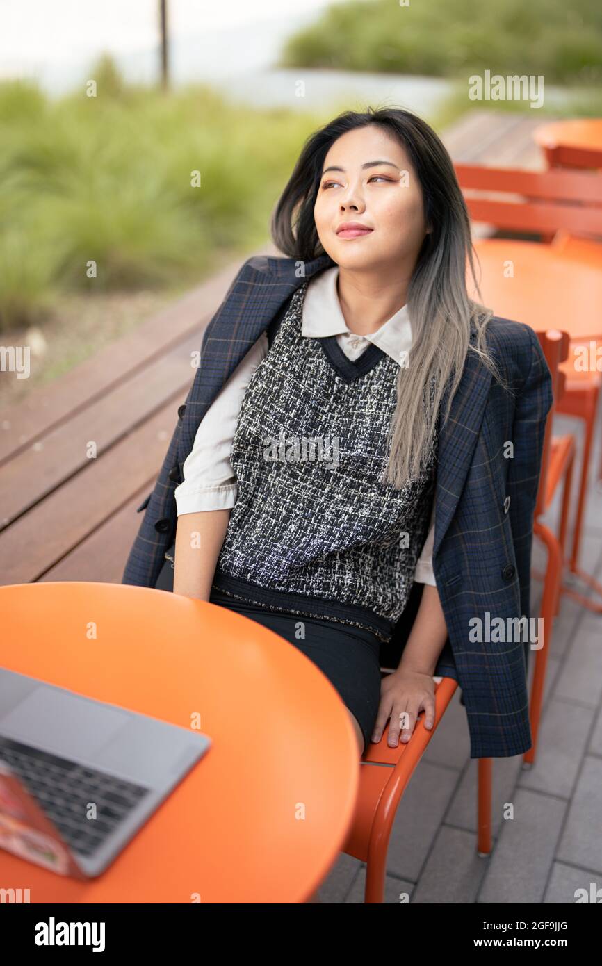 Young Asian Female Data Scientist Enjoying Working Outside Stock Photo ...