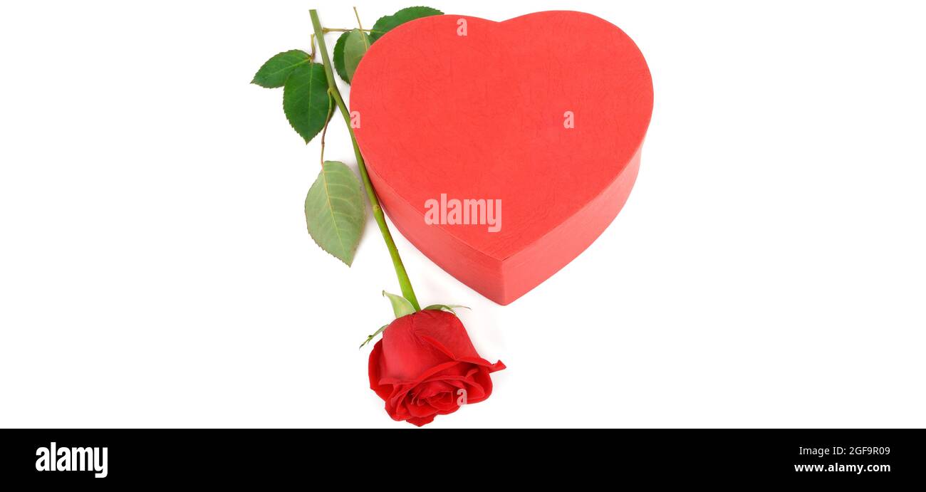 Gift box in the form of heart and scarlet rose isolated on white ...