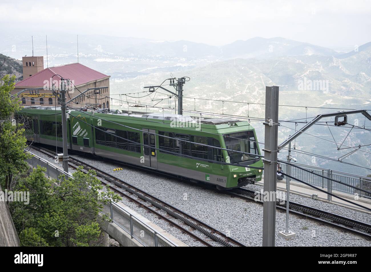 BARCELONA, SPAIN - Jun 28, 2021: A cogwheel train arriving at the ...