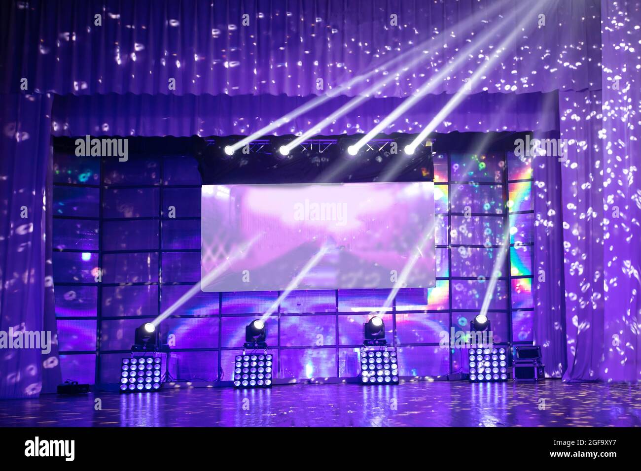Scene in violet light with spotlights Stock Photo - Alamy