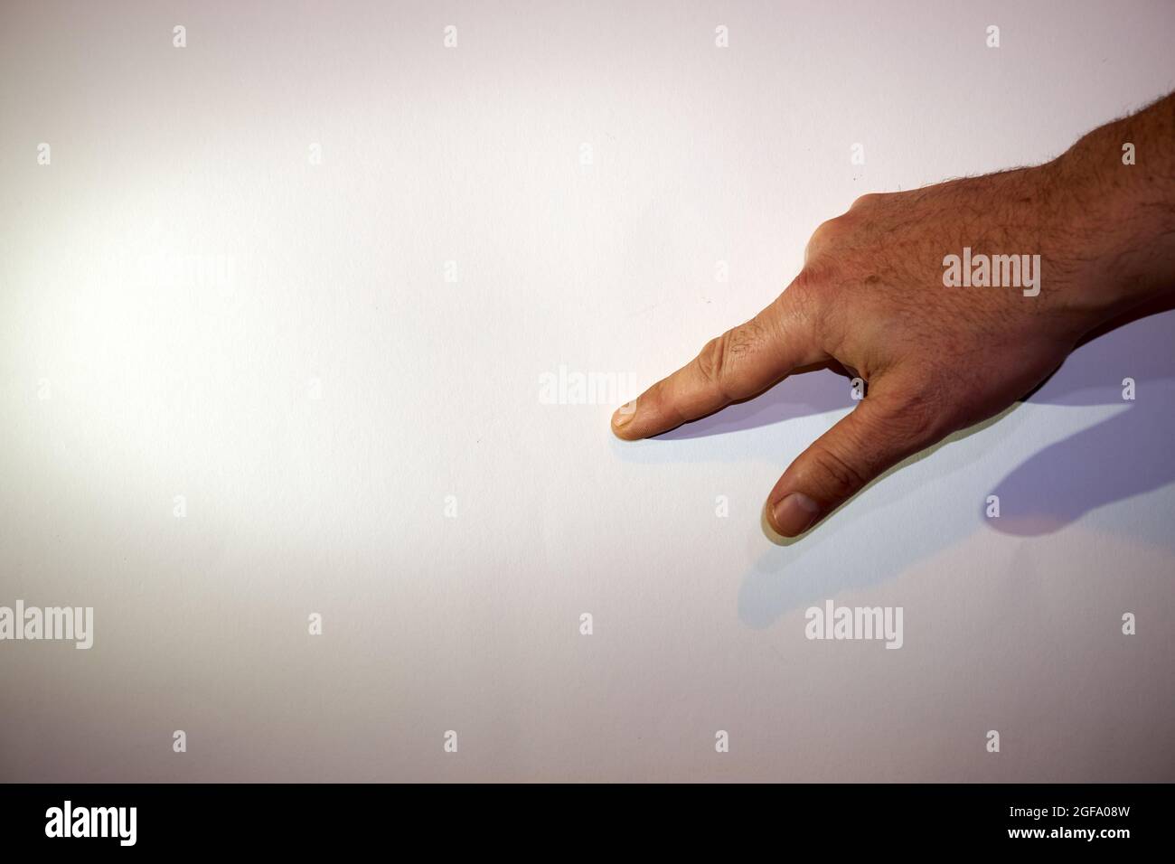 The gesture of a hand on white background, isolated Stock Photo - Alamy