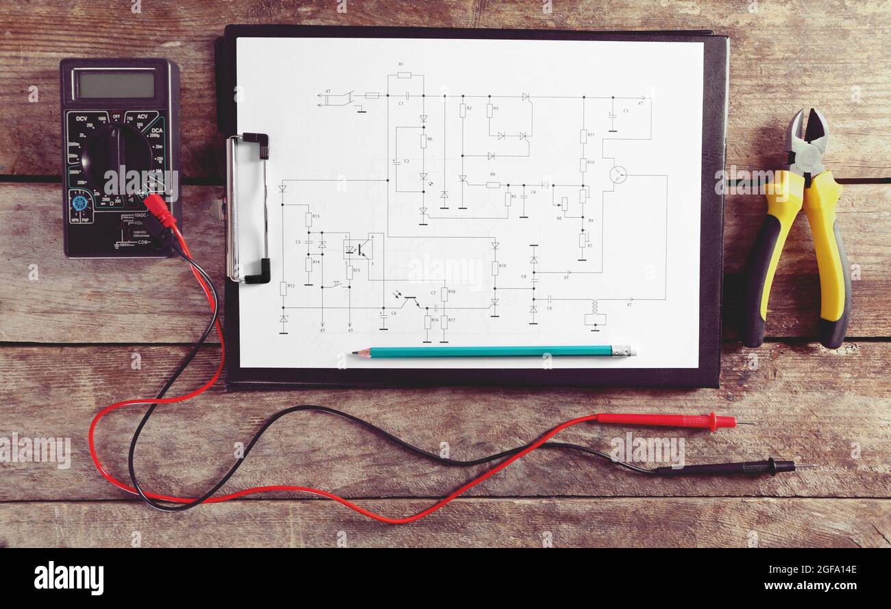 Electrical drawing with tools on wooden table, top view Stock Photo - Alamy