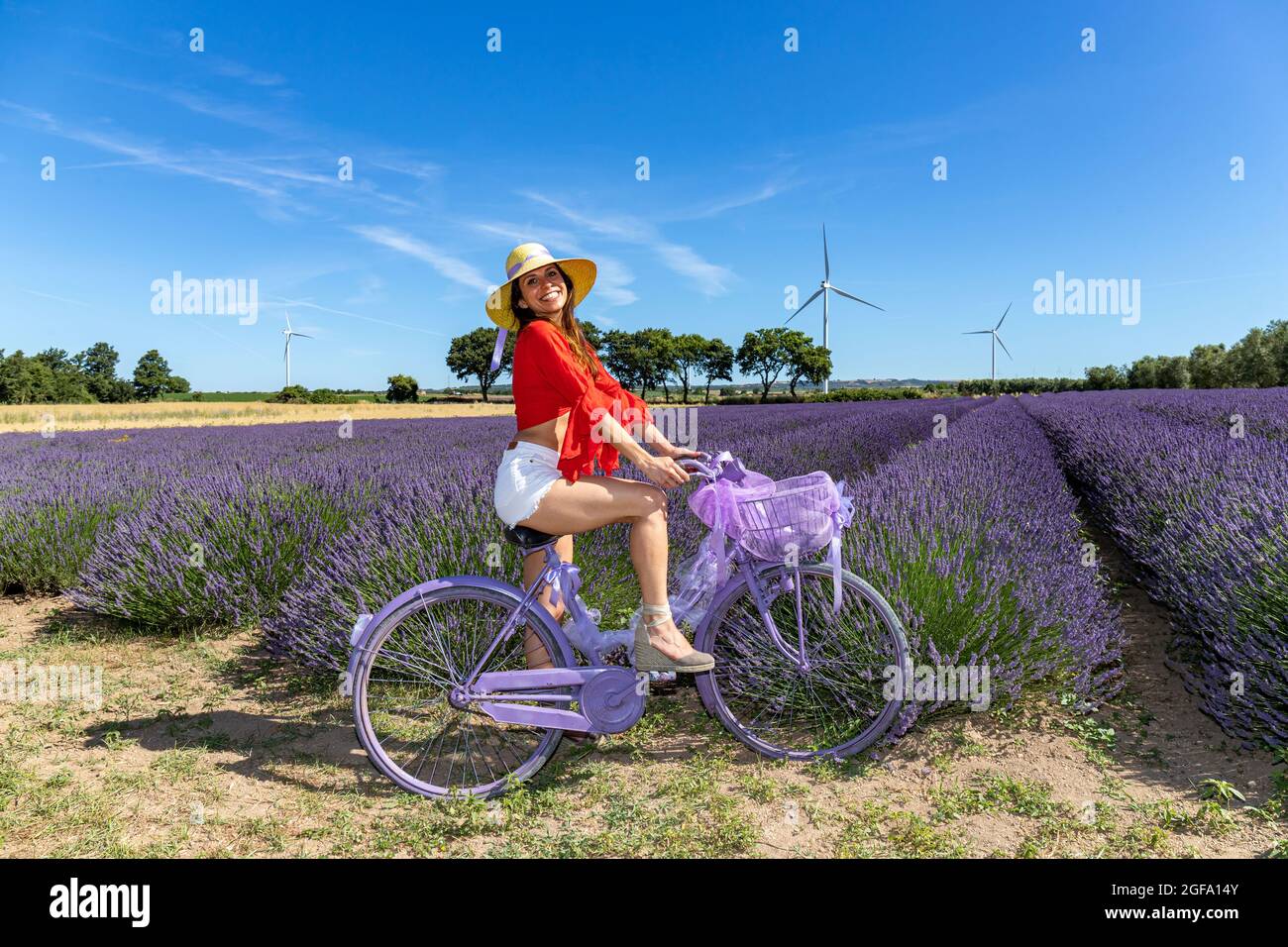 Smiling girl wearing on blouse hi-res stock photography and images - Alamy
