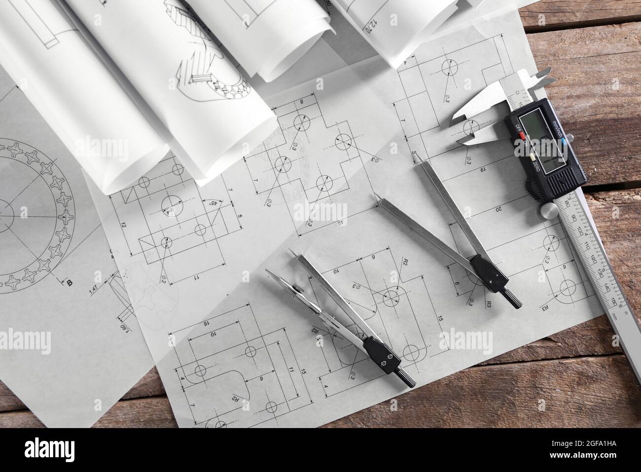 Set of engineering drawings with tools, top view Stock Photo - Alamy