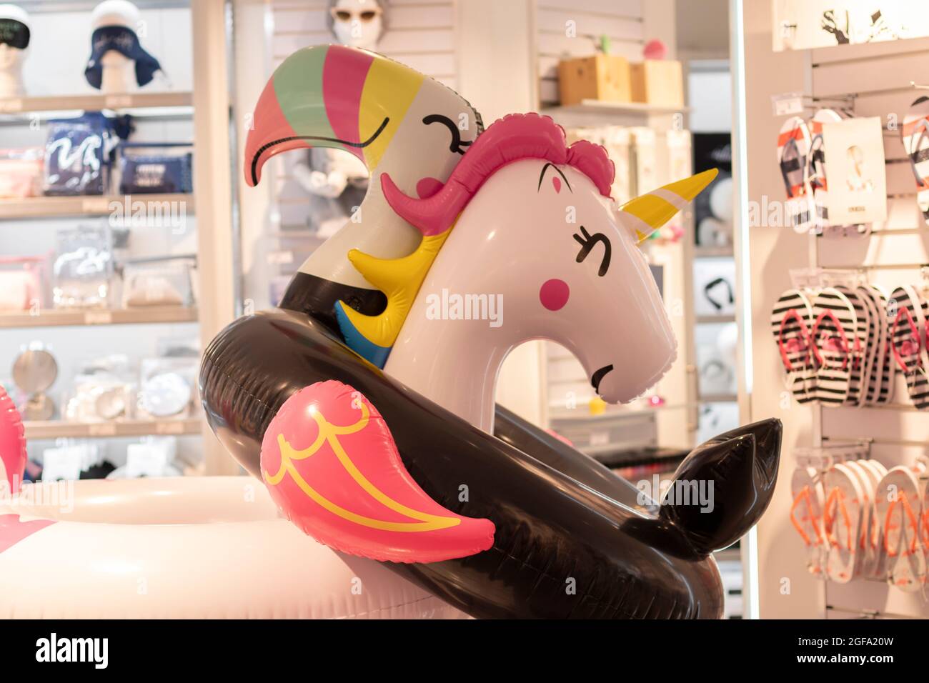 Giant inflatable flamingo, selective focus, pool float party, trendy ...