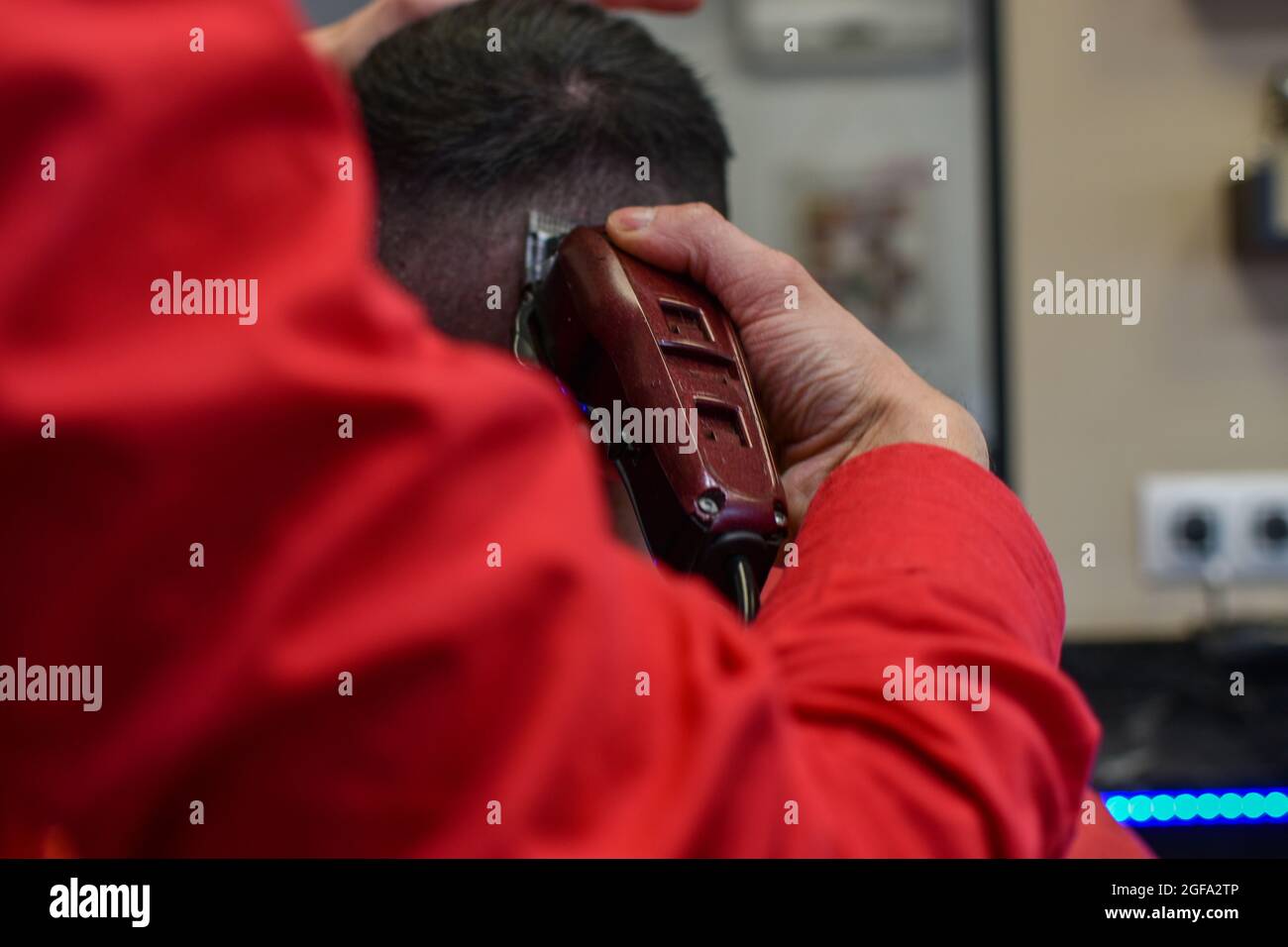 Hand cutting hair hi-res stock photography and images - Alamy