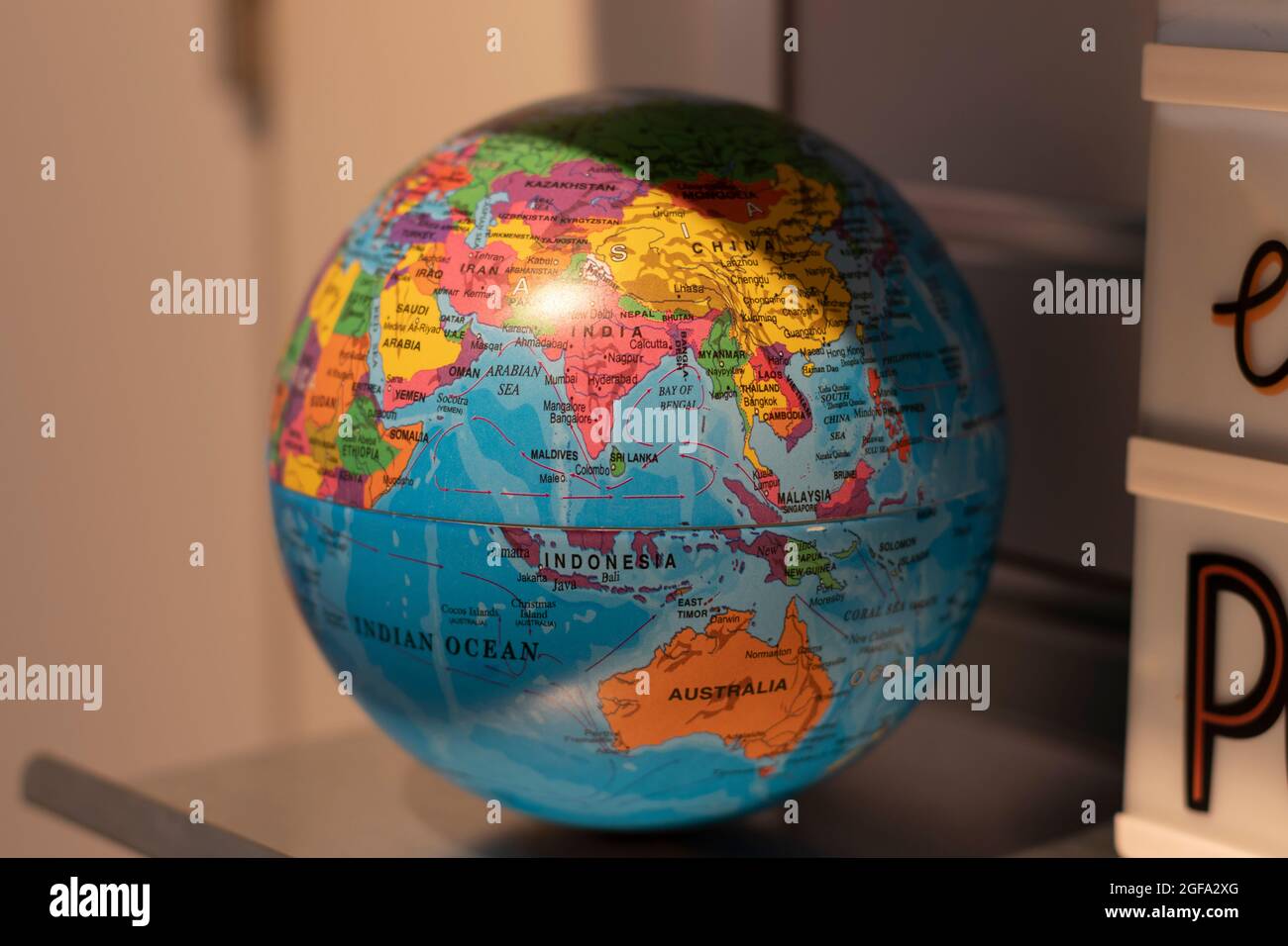 A globe of the planet earth on a shelf. Decoration concept Stock Photo ...