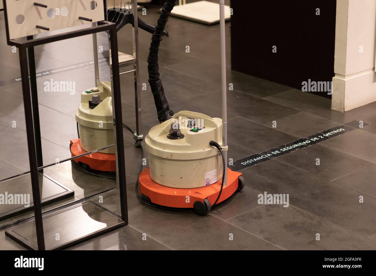 a professional steam iron. Inside a store Stock Photo - Alamy