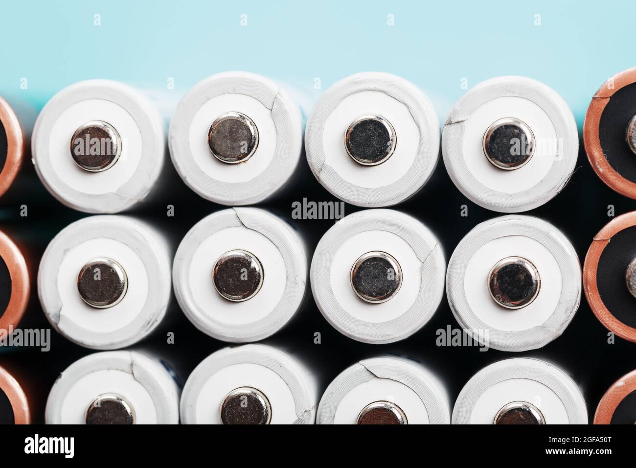 AA batteries as a texture background in full screen. The concept of ...