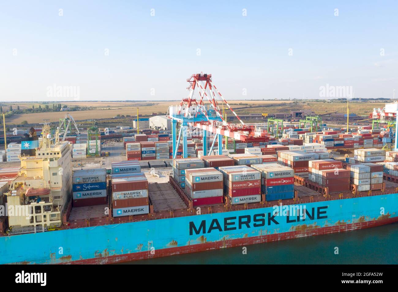 ODESSA, UKRAINE - AUGUST 10, 2021: Loading a container ship at seaport ...