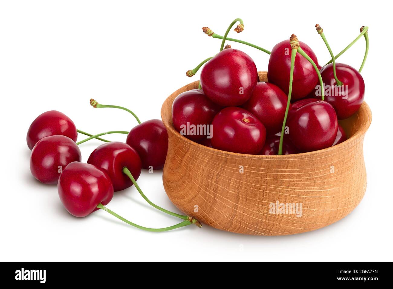 red sweet cherry in wooden bowl isolated on white background with ...