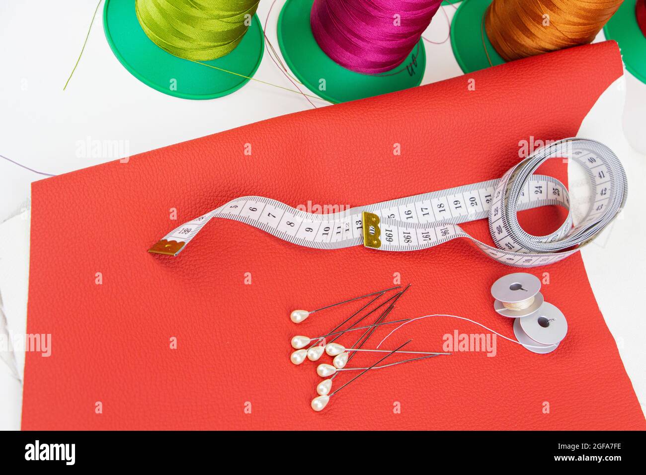 Pieces of fabric and thread. Tailoring, production of clothing and ...