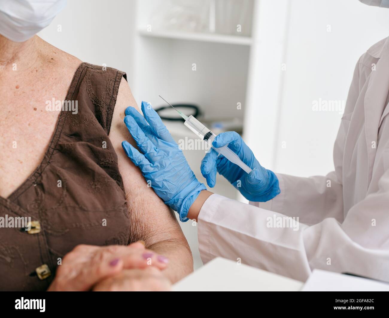 a shot in the arm in the arm Patient vaccine passport hospital ...