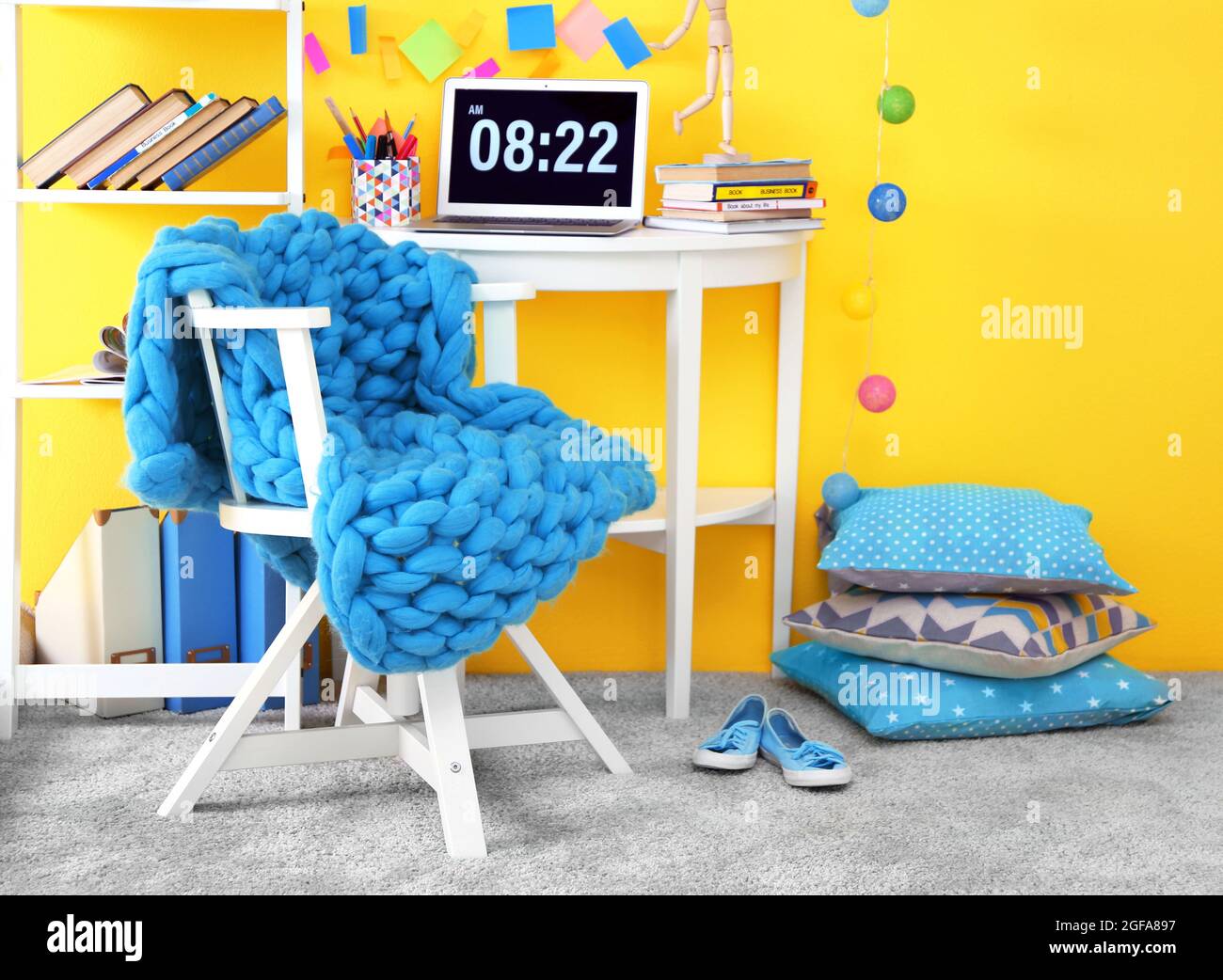 Workplace for teenager with table and chair Stock Photo - Alamy