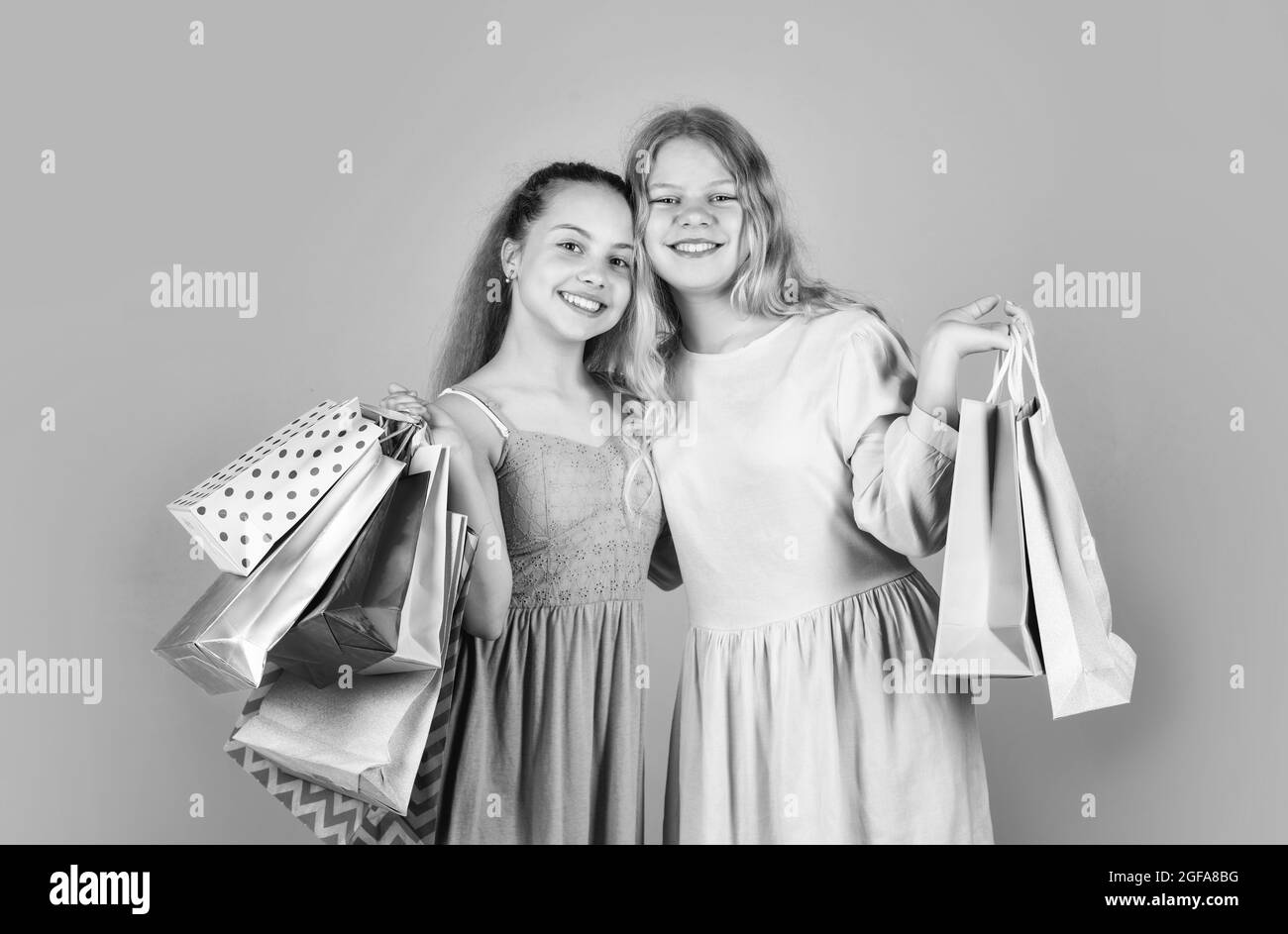 Teen girls shopping bags Black and White Stock Photos & Images - Alamy