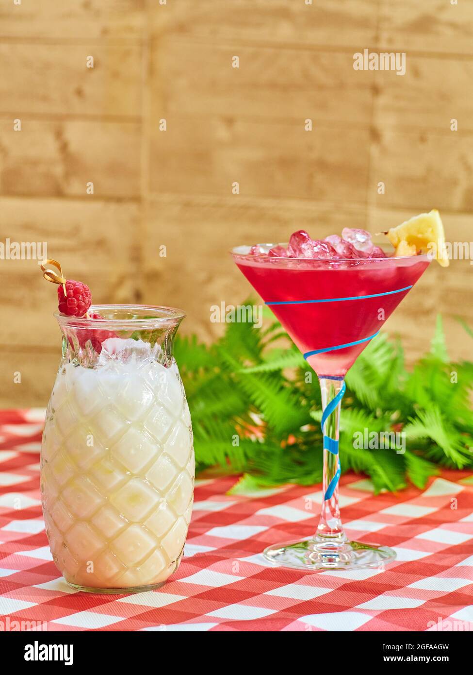 Vertical shot of a raspberry cocktail and a pina colada Stock Photo - Alamy