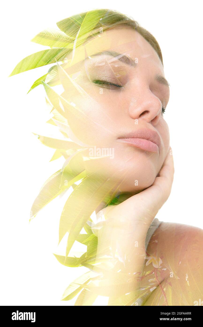 Creative double exposure portrait mixed with a photograph of a plant ...